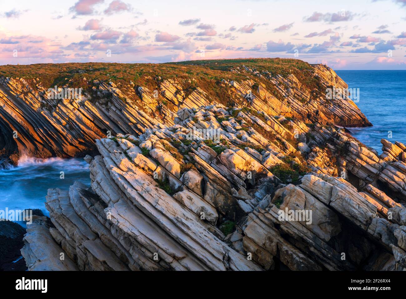 Beautiful schist cliff details in Baleal island at sunset in Peniche ...