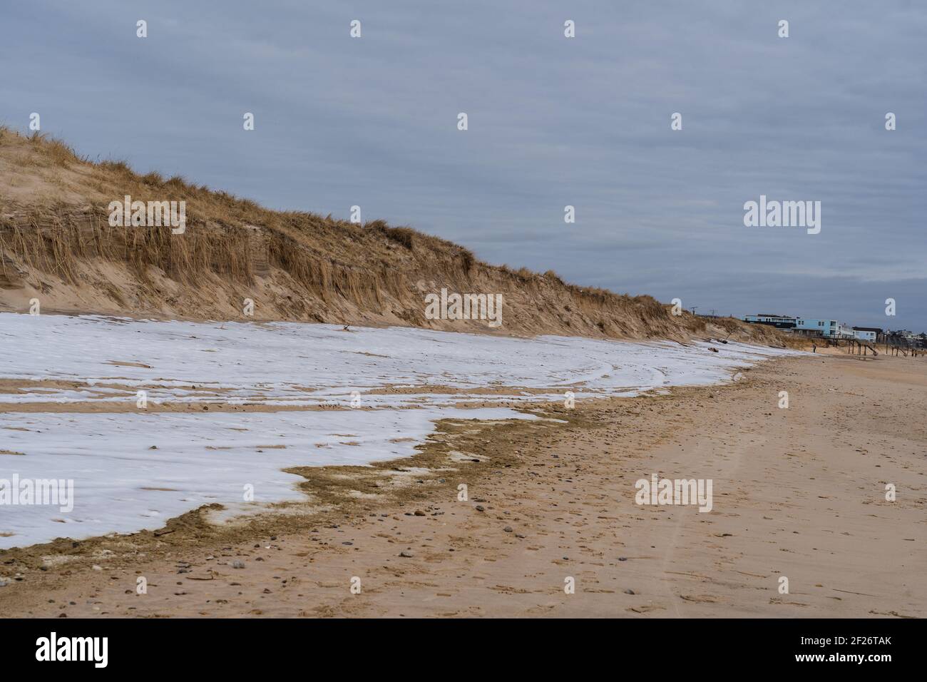 The beach in Montauk during the Winter, with snow covering part of the ...