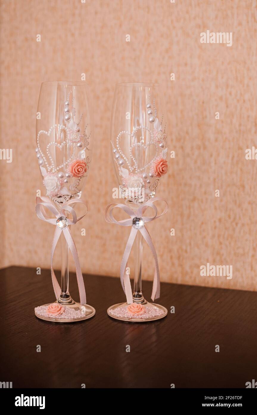 Two champagne glasses wedding rings hi-res stock photography and images ...