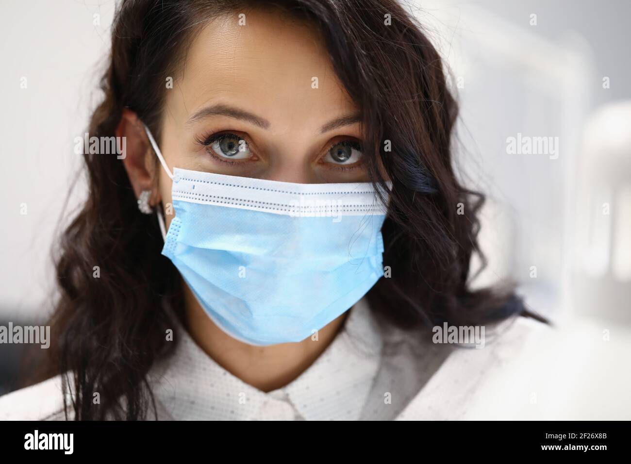 Cute lady sitting in room Stock Photo - Alamy