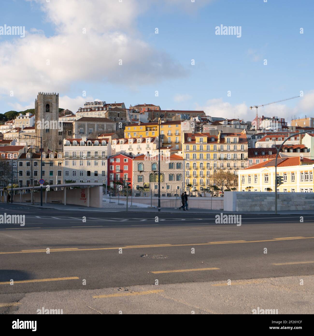 Beautiful colorful historic buildings in Lisbon with a road, in ...