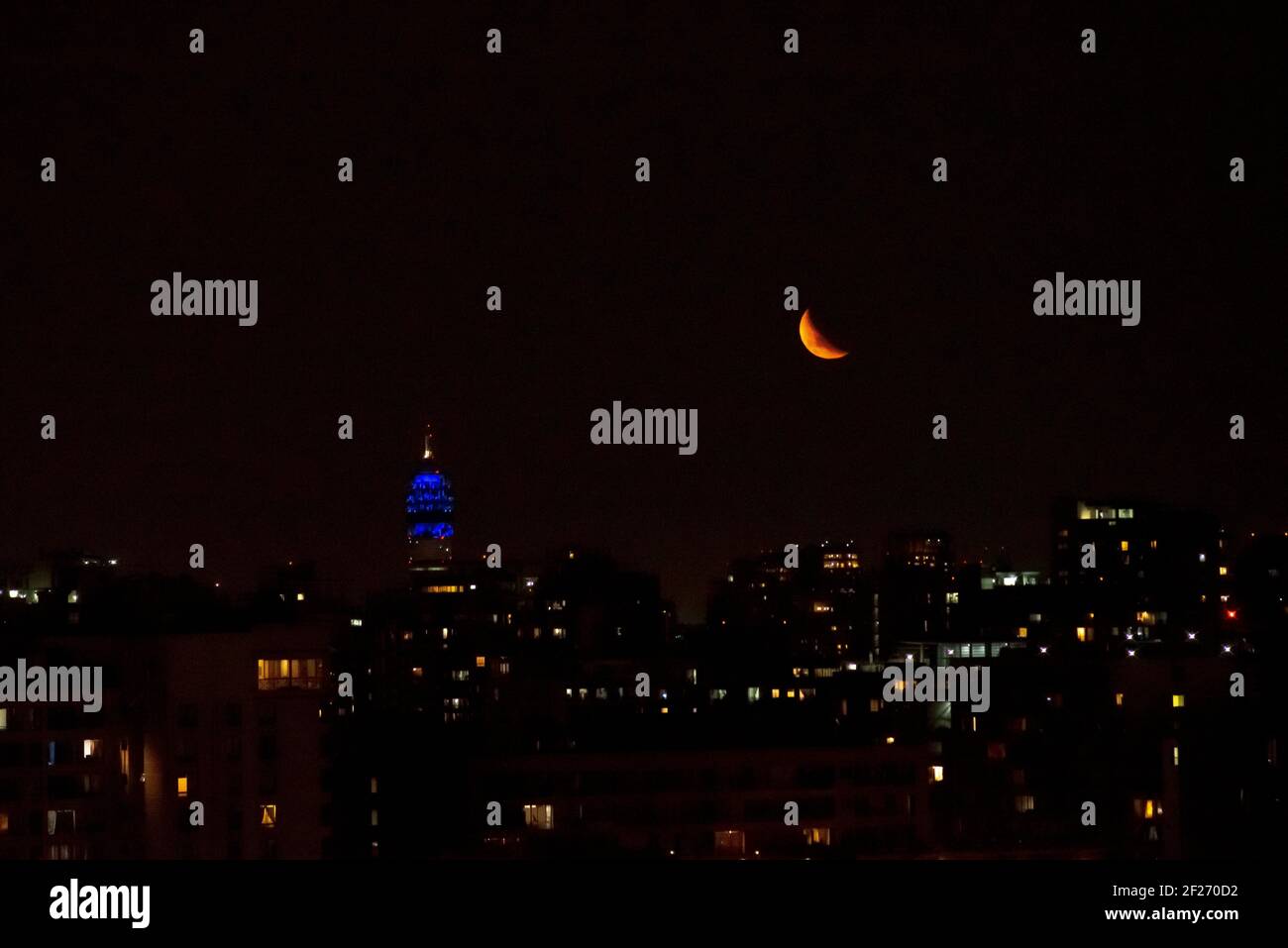 Panoramic view of Santiago de Chile at night with the moon Stock Photo ...