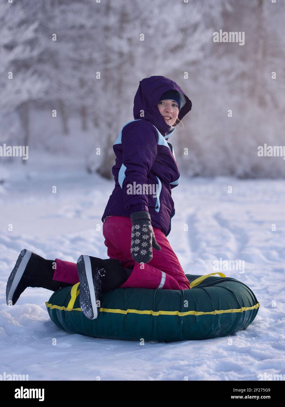 Smiling teen girl enjoying winter activity outdoors Stock Photo - Alamy
