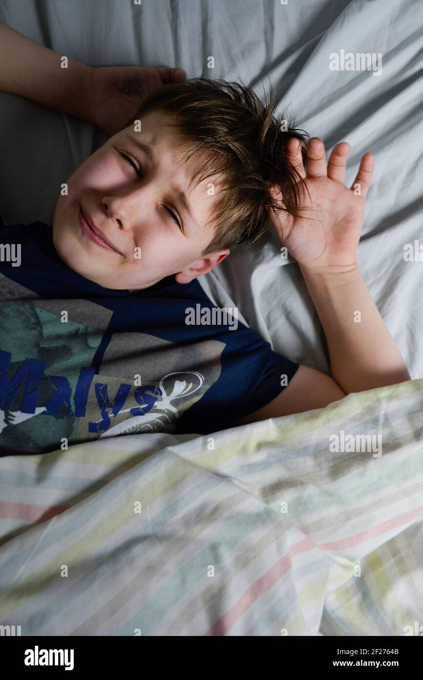 Boy making his bed hi-res stock photography and images - Alamy