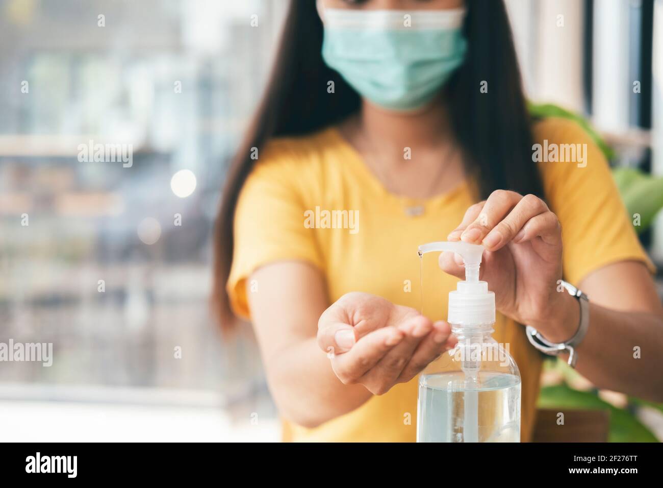 Using hand gel hi-res stock photography and images - Alamy