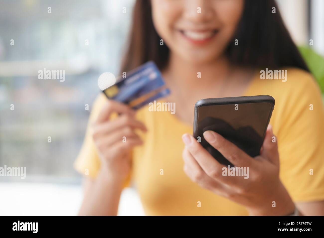 Customer shopping online pay by credit card Stock Photo - Alamy