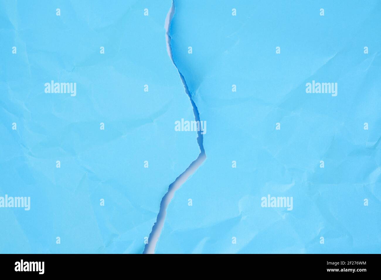 Blue torn crumpled paper texture Stock Photo - Alamy