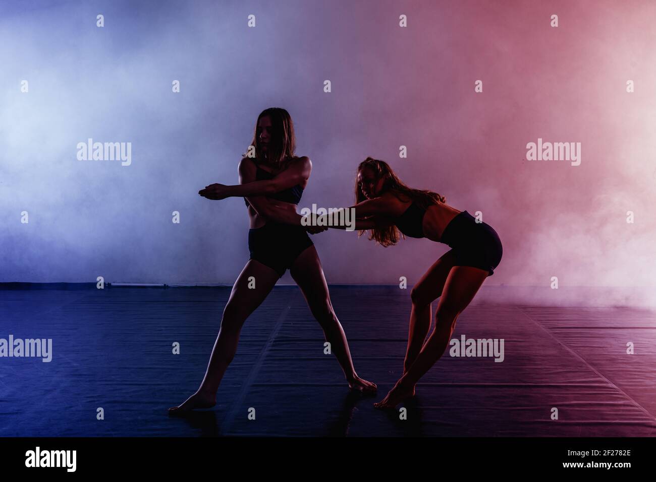 Contemporary dancing performers in dance practice class Stock Photo - Alamy