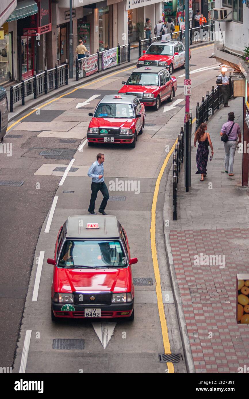 Red taxi cars hi-res stock photography and images - Alamy