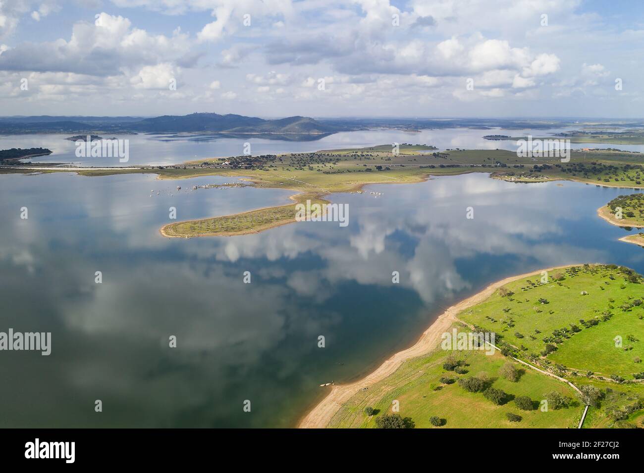 Lake reservoir water reflection drone aerial view of Alqueva Dam ...