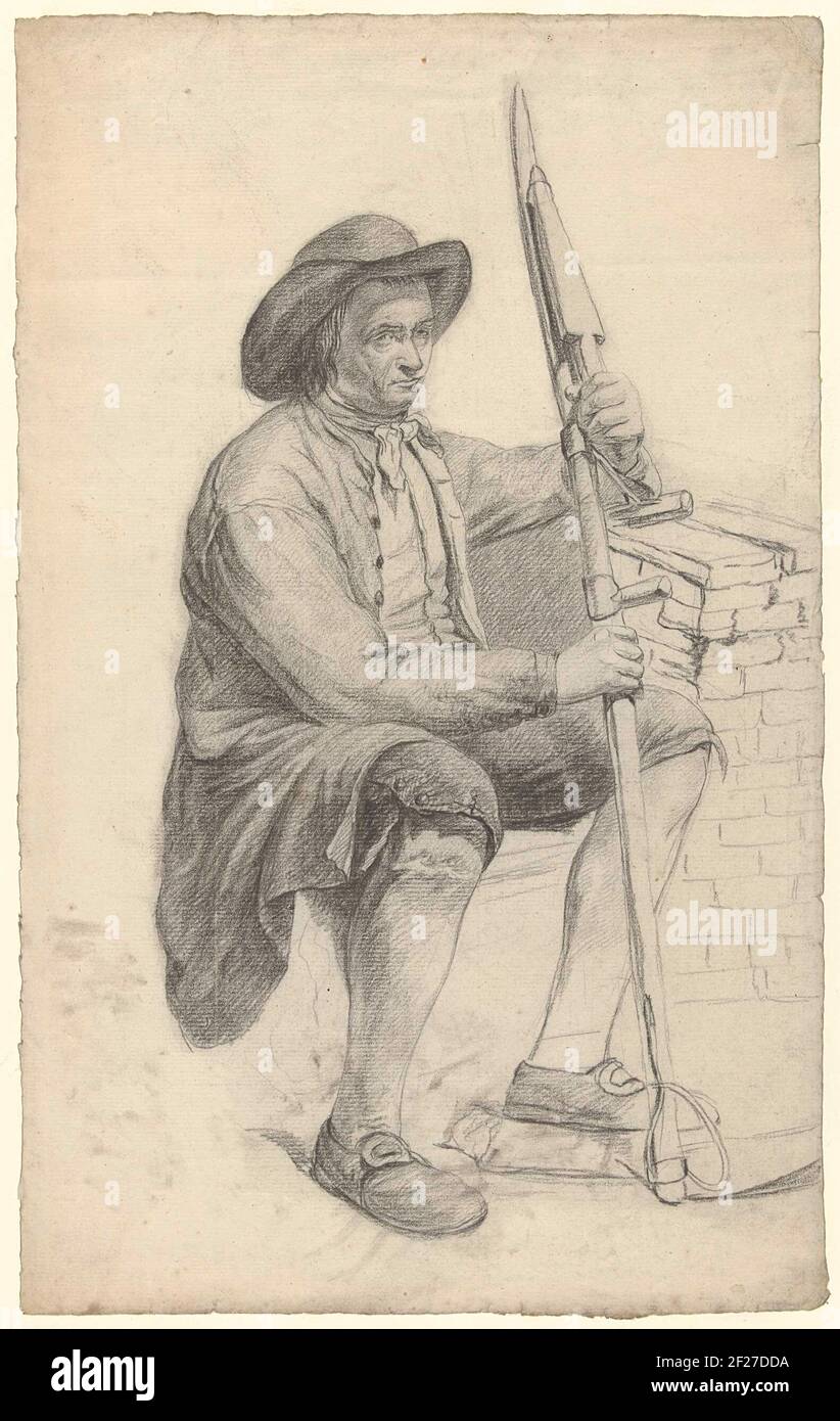 Sitting man with zeis in both hands Stock Photo - Alamy