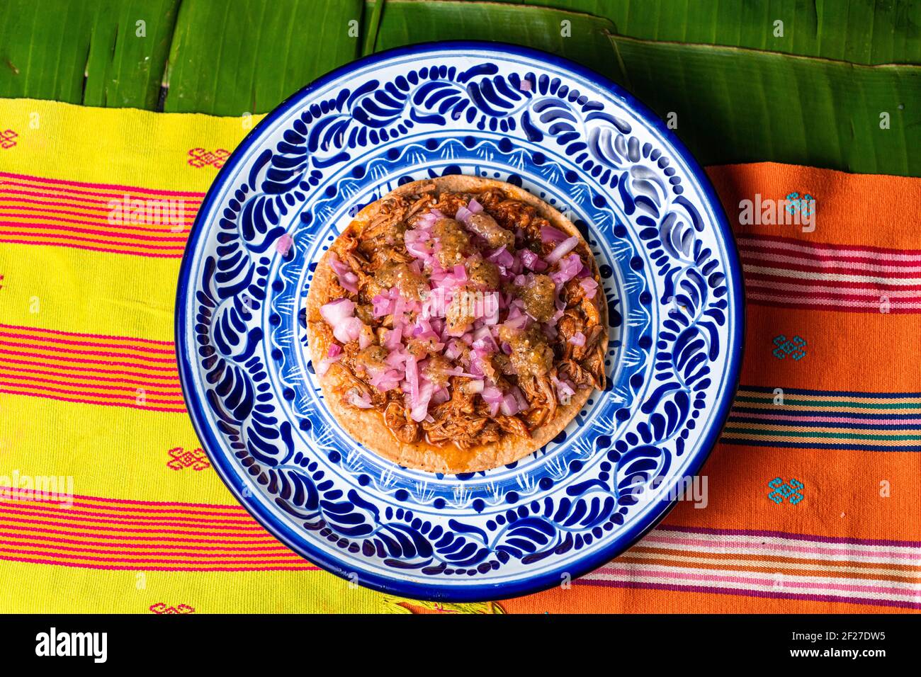 tostada, typical Mexican dish, made from cochinita pibil Stock Photo ...