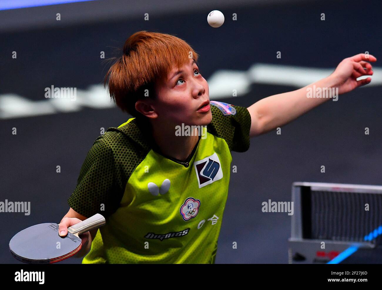 Doha, Qatar. 10th Mar, 2021. Cheng I-Ching of Chinese Taipei serves ...