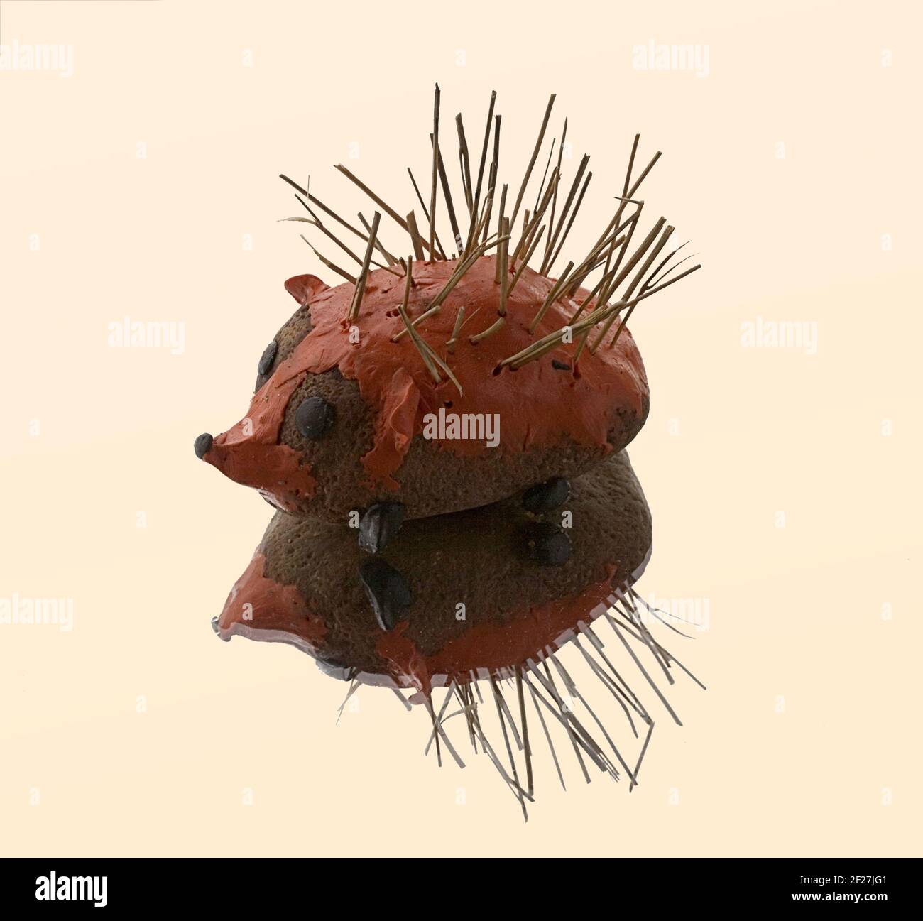 Plasticine hedgehog on mirror Stock Photo - Alamy