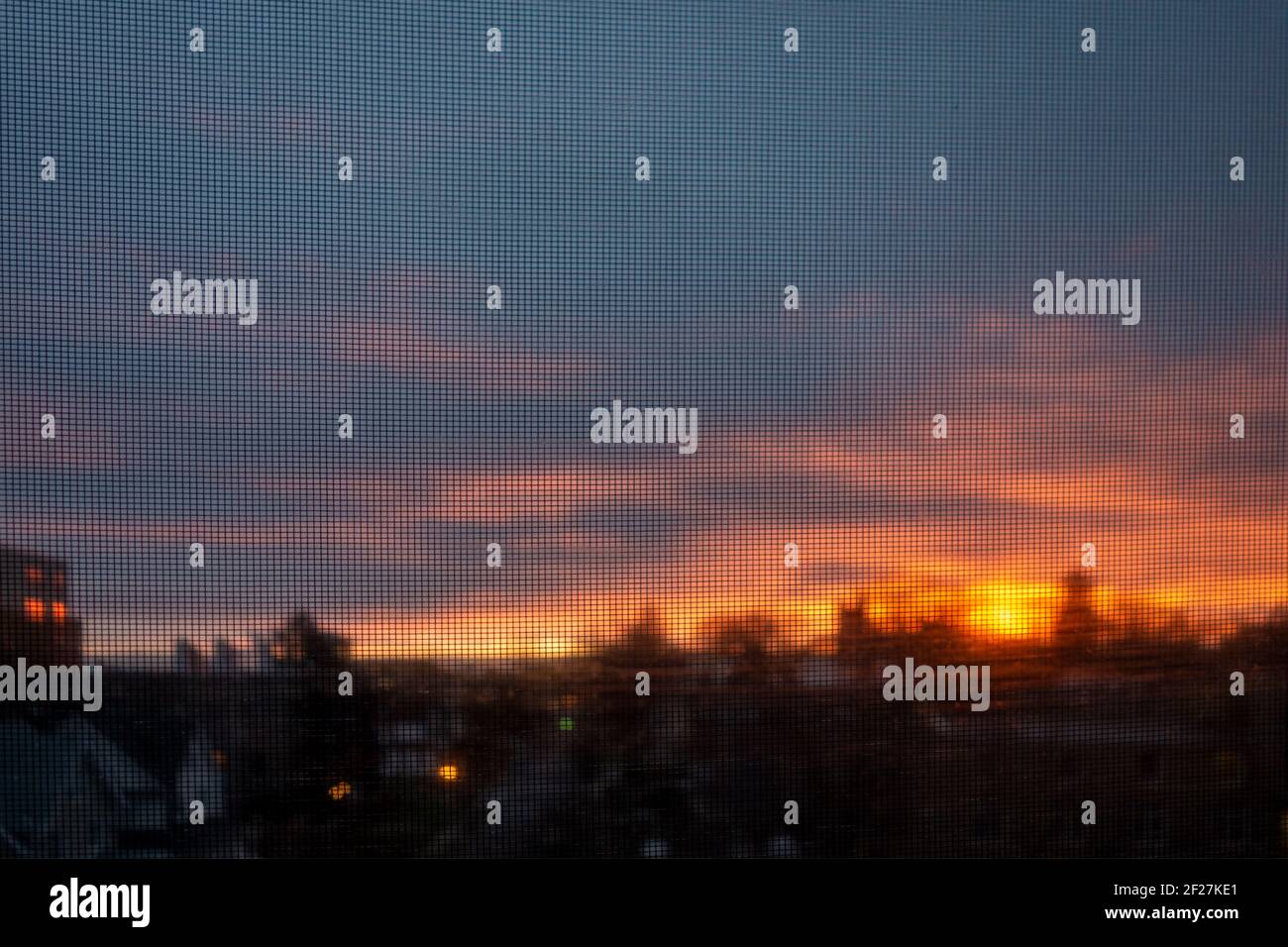 Image focusing on window screen the image background of sunrise or ...