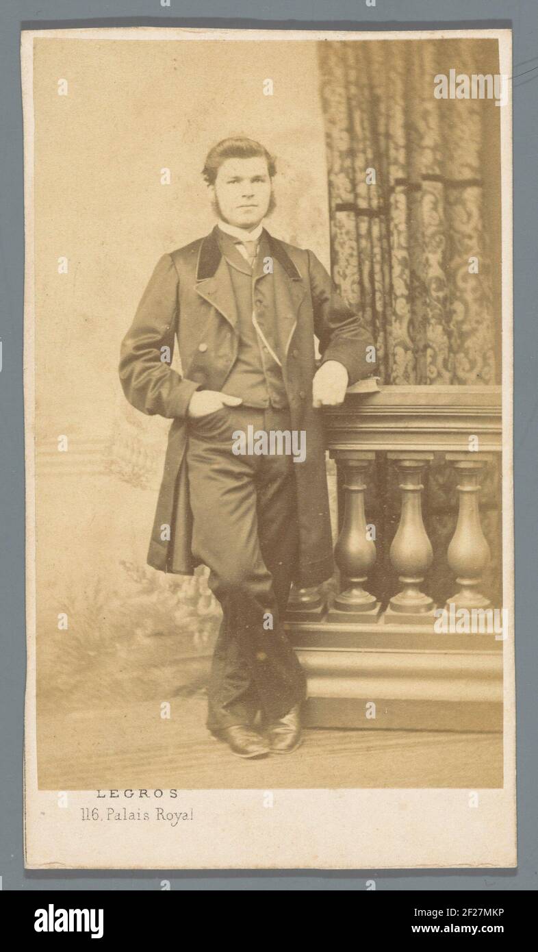 Portrait man at balustrade Stock Photo - Alamy