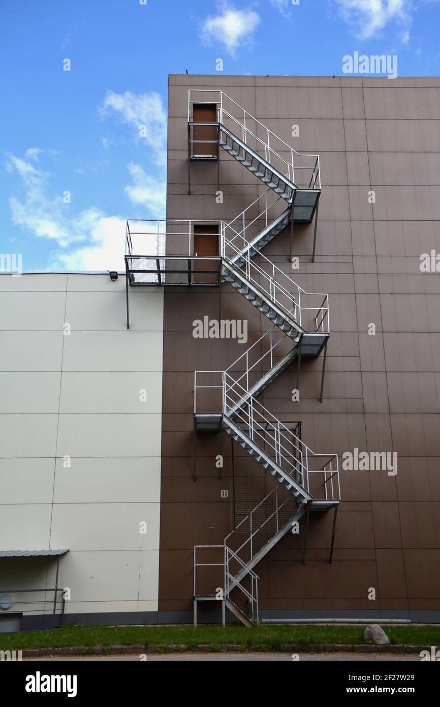 external fire escapes stairs on modern building wall Stock Photo - Alamy