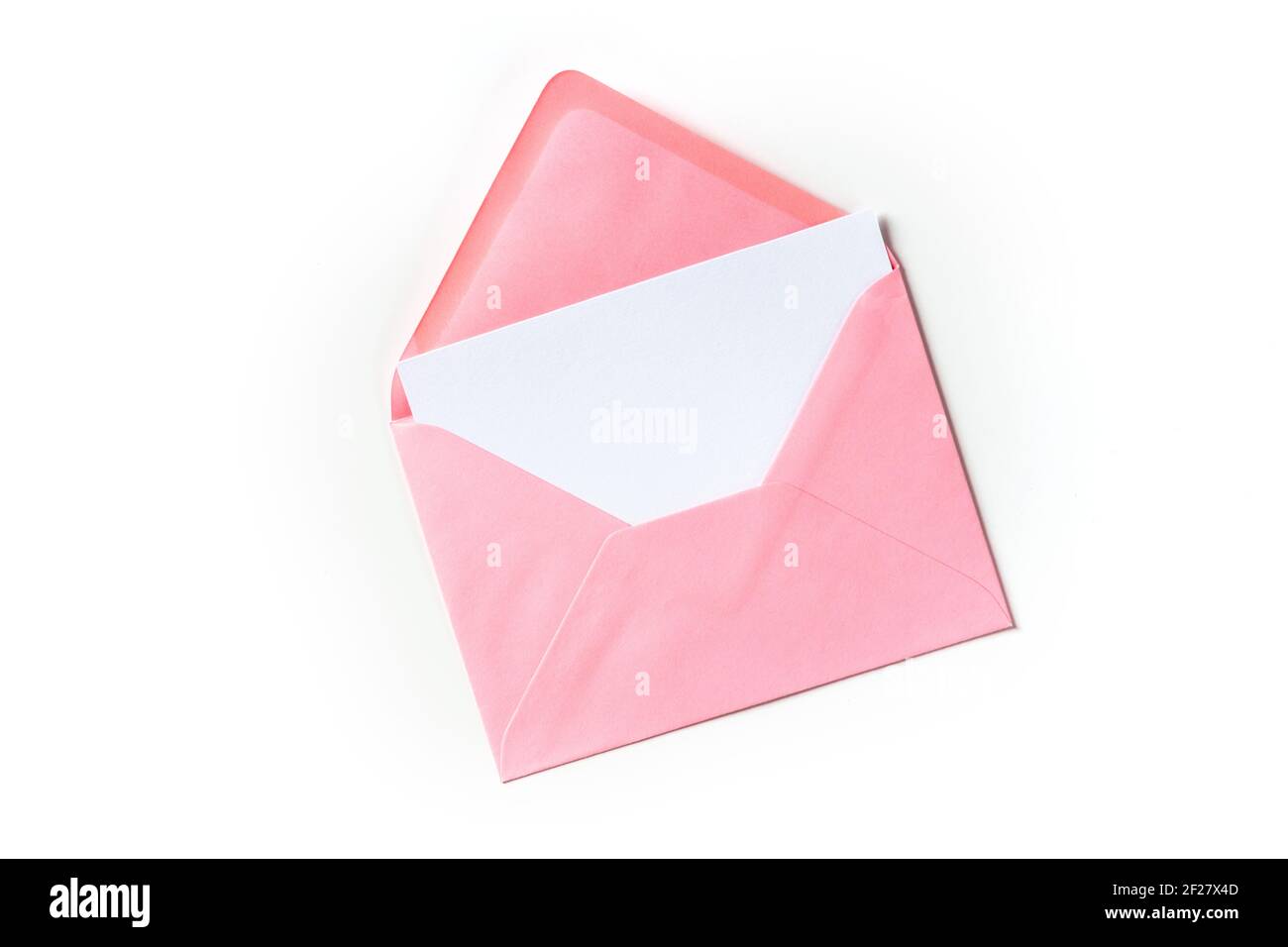 A greeting card in a pastel pink envelope mock up, overhead shot Stock ...