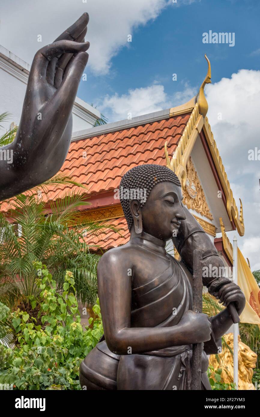 The out stretched hand of a Leela attitude Buddha over the Forest Monk ...