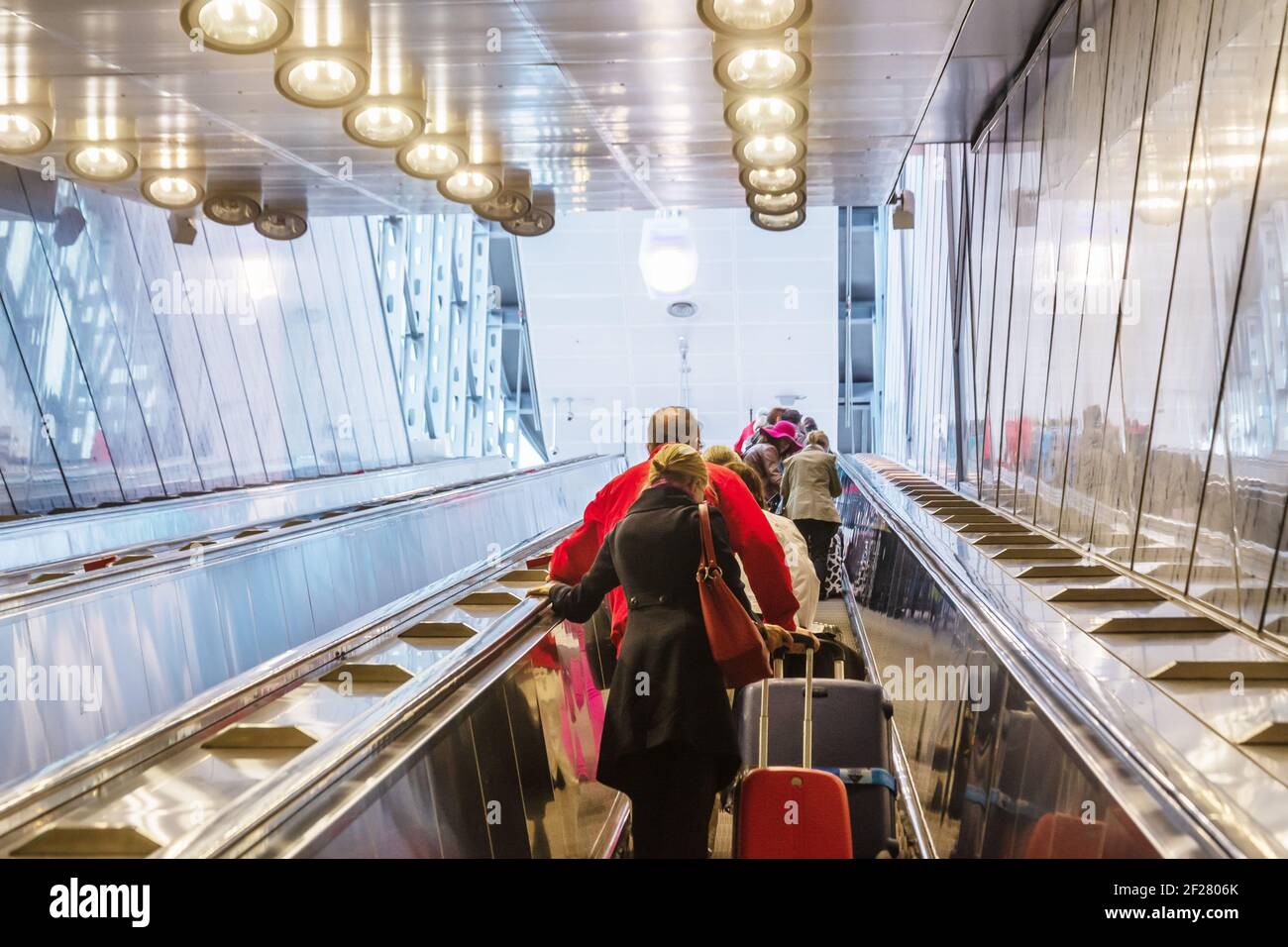 People on escalator at Helsinki airport in Helsinki Finland Stock Photo ...
