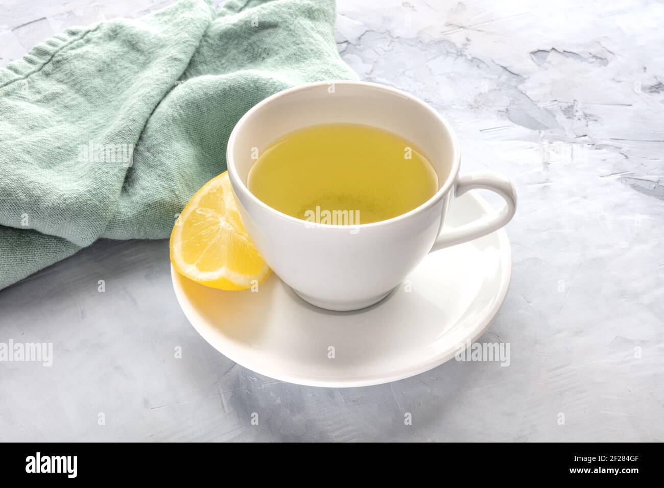 A photo of a cup of tea with lemon Stock Photo - Alamy