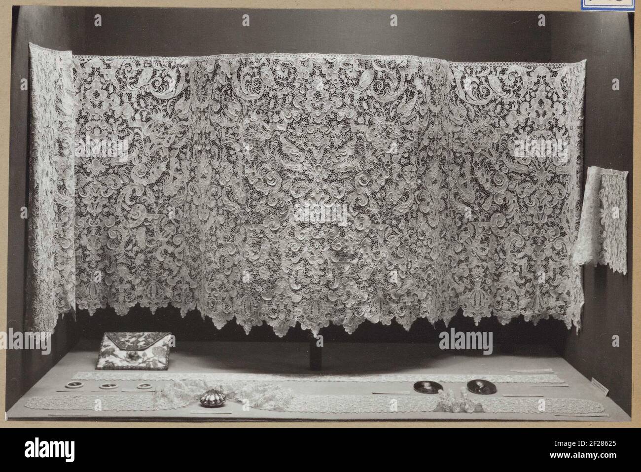 Showcase with various objects; Exhibition lace and smaller Stock Photo ...