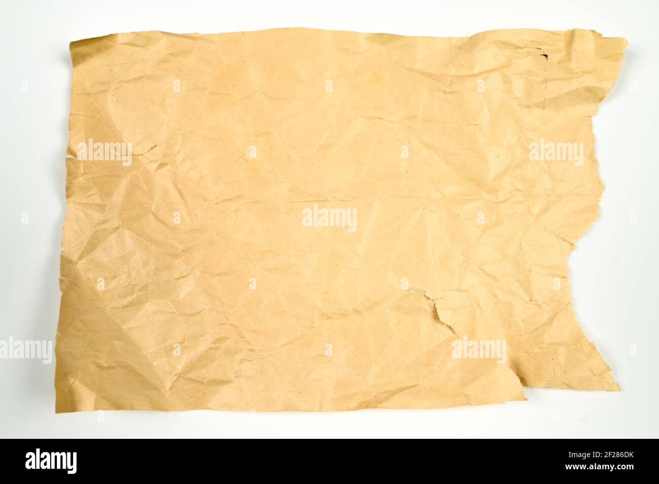 Yellow crumpled, torn paper on isolated white background . High quality ...