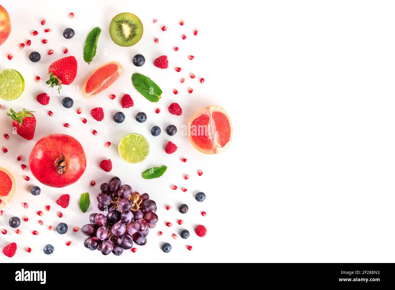 Fresh fruit, shot from the top on a white background Stock Photo - Alamy