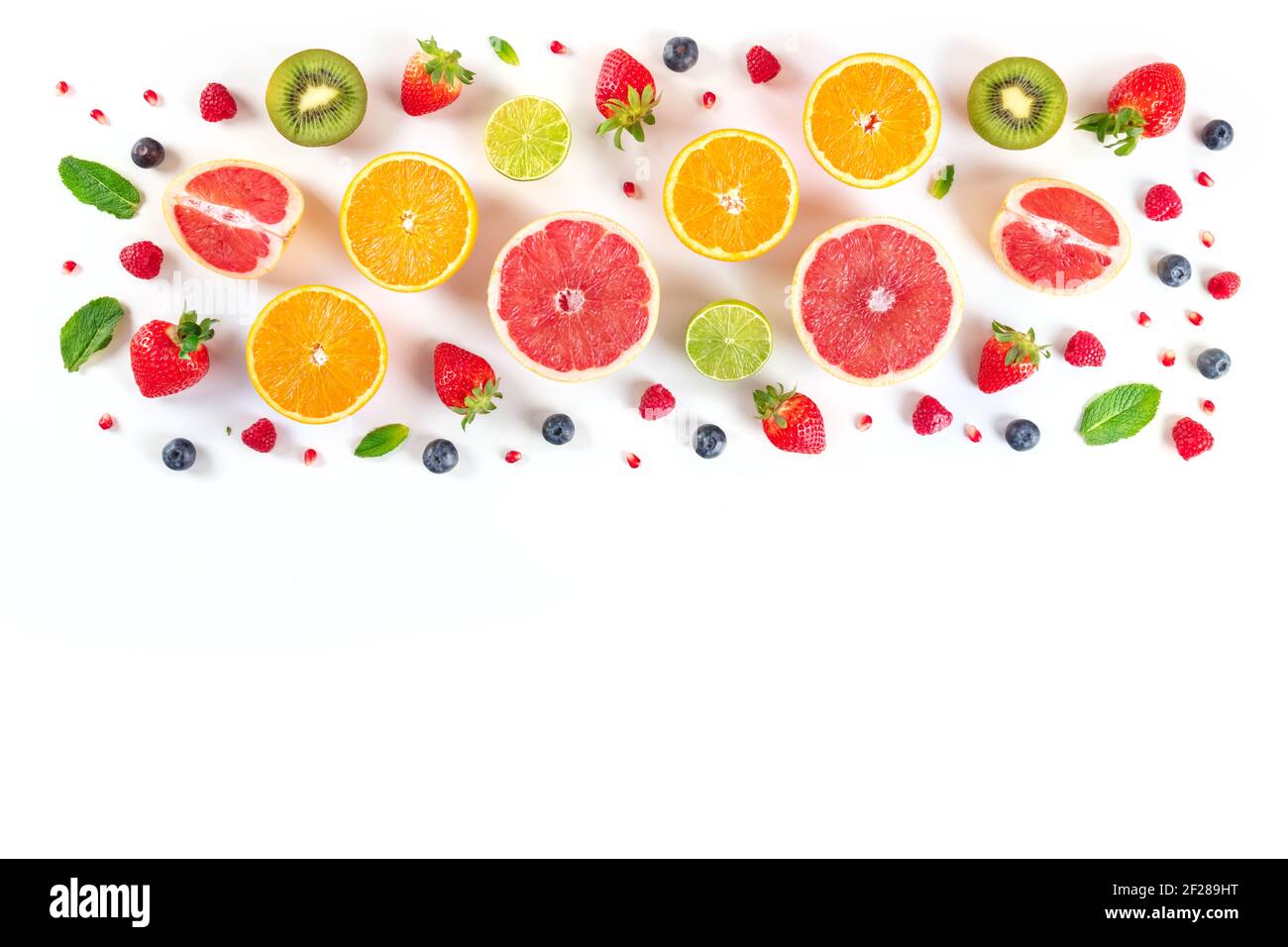 Fresh fruit design template, a flatlay overhead shot on a white ...