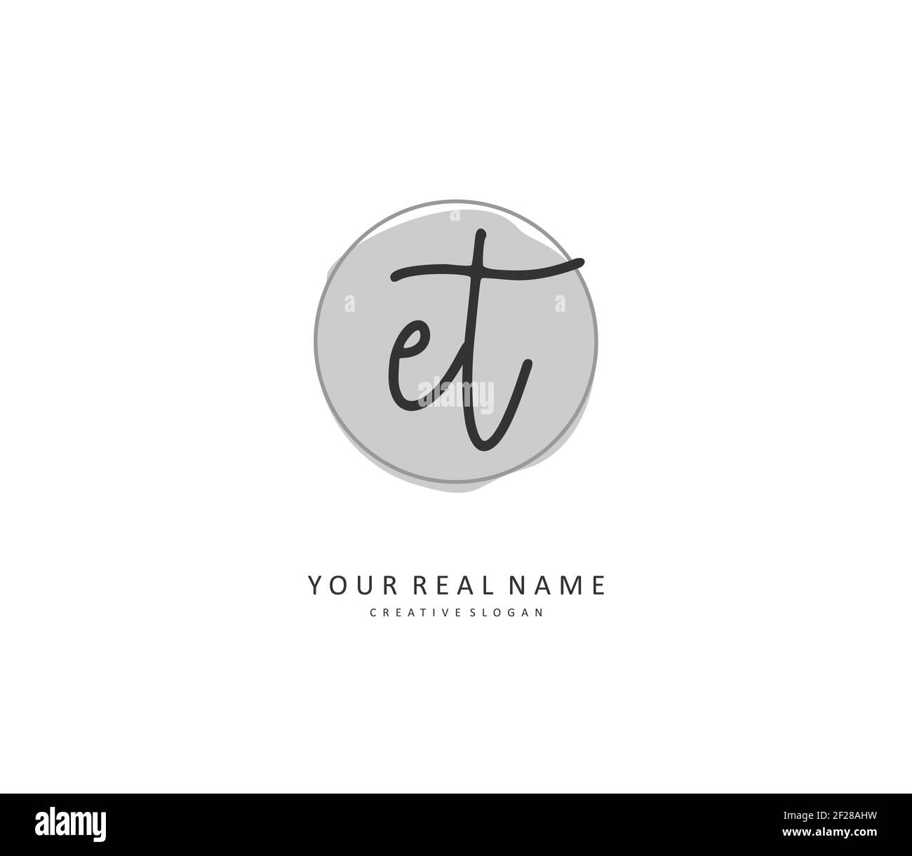 E T ET Initial letter handwriting and signature logo. A concept ...
