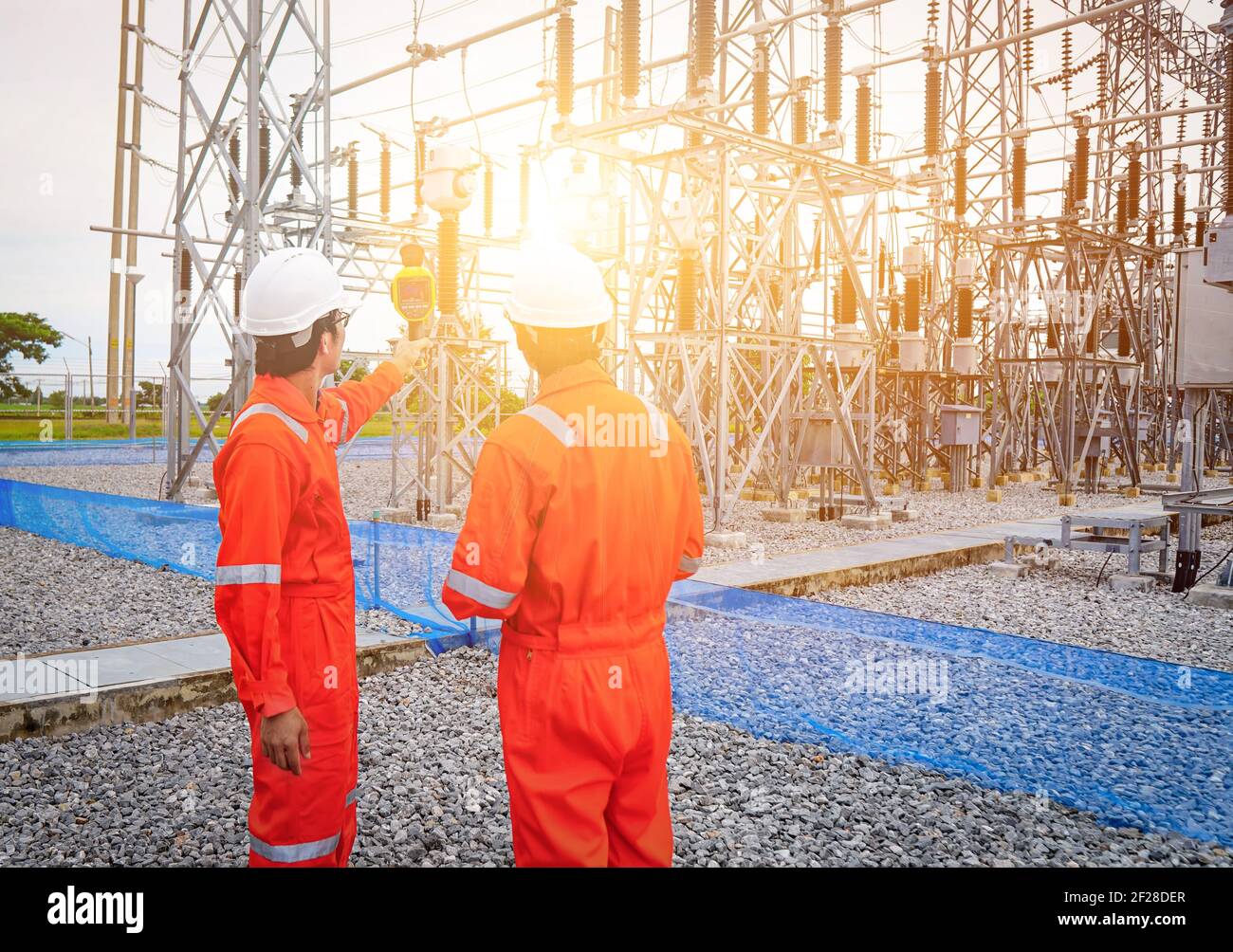 Electrical engineers used a thermometer to check for faults in ...