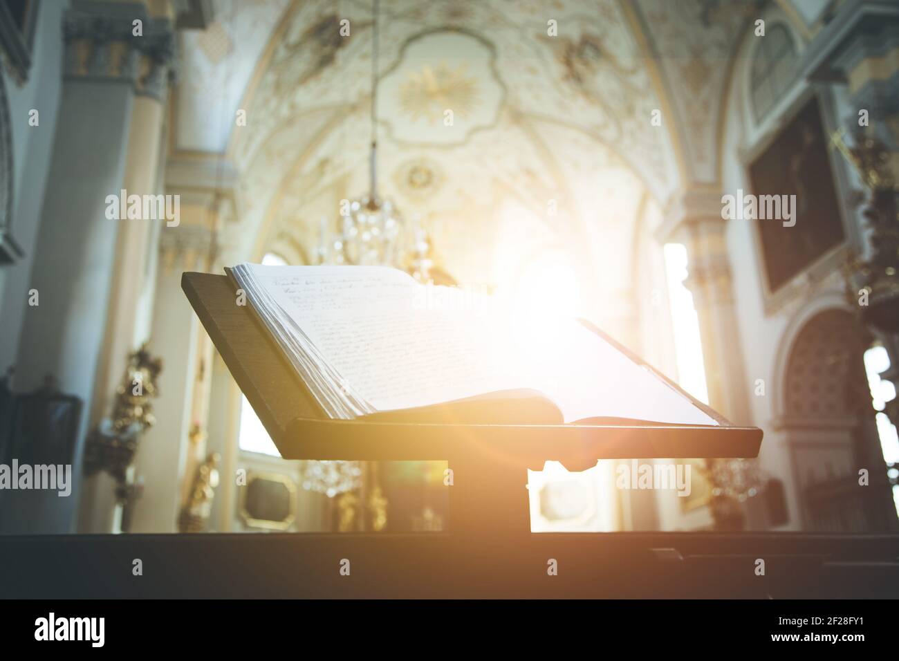 Praying in the church: Bible or prayer book on the altar Stock Photo ...