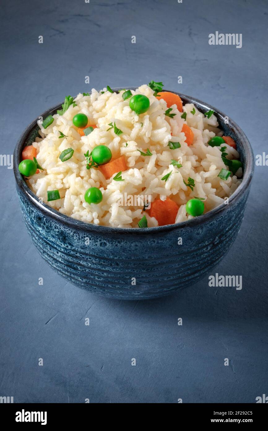 Vegan rice on a dark blue background Stock Photo - Alamy