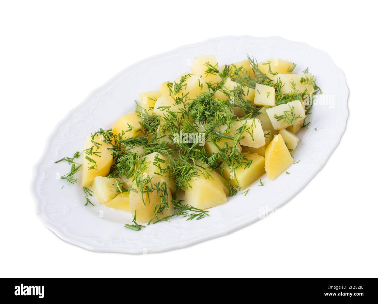 Delicious potatoes with minced dill. Isolated on a white background ...