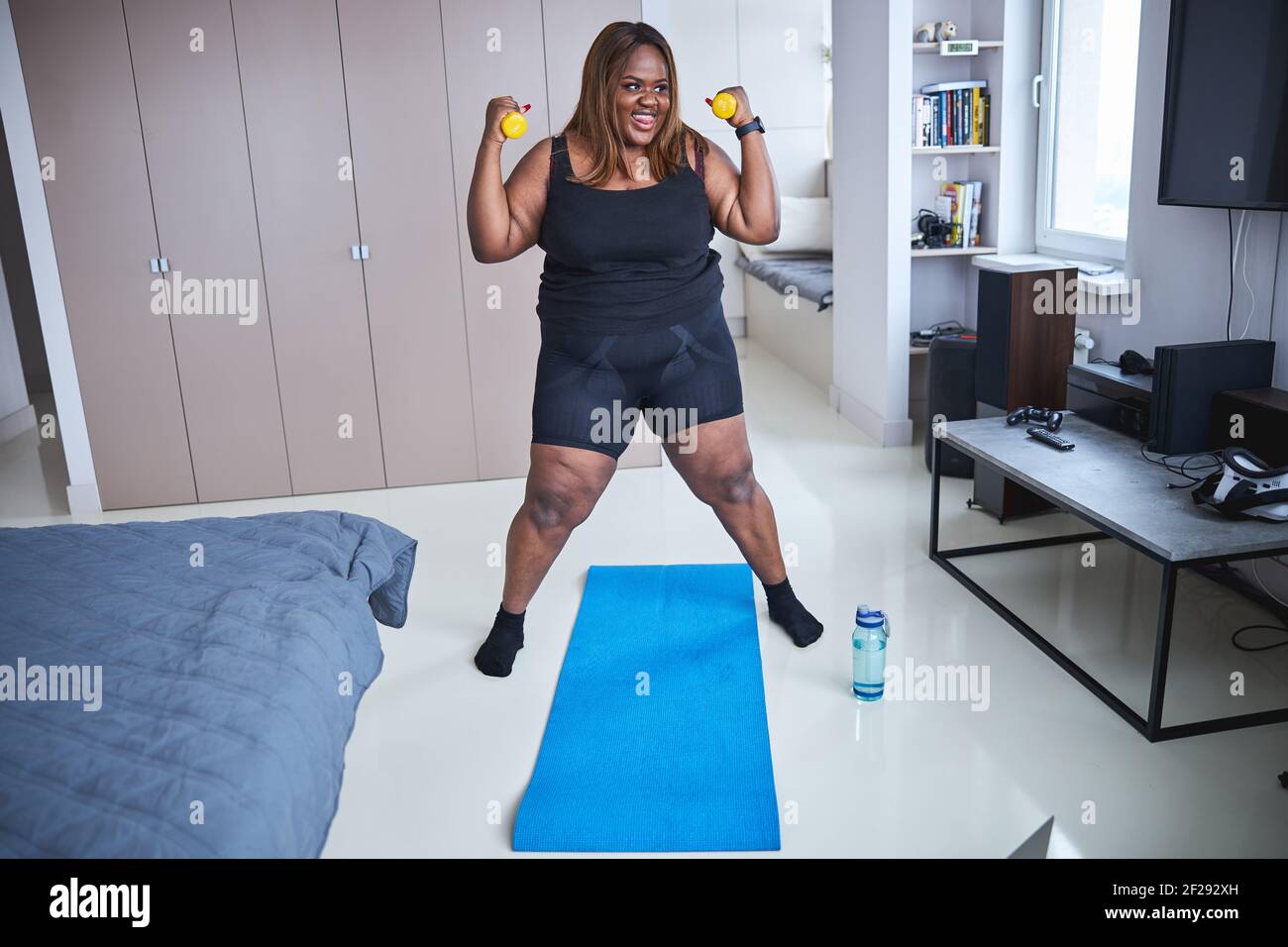 Lady stretching body yoga exercises hi-res stock photography and images ...