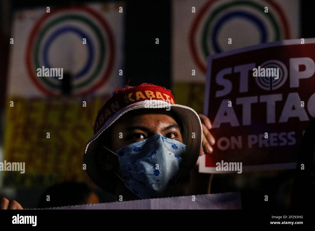 Press freedom advocates shout slogans during a protest in front of the ...