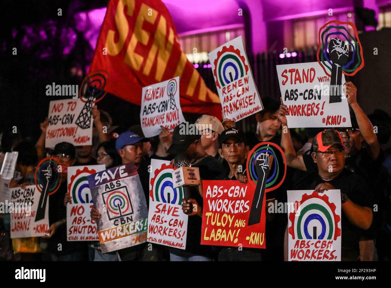 Press freedom advocates shout slogans during a protest in front of the ...