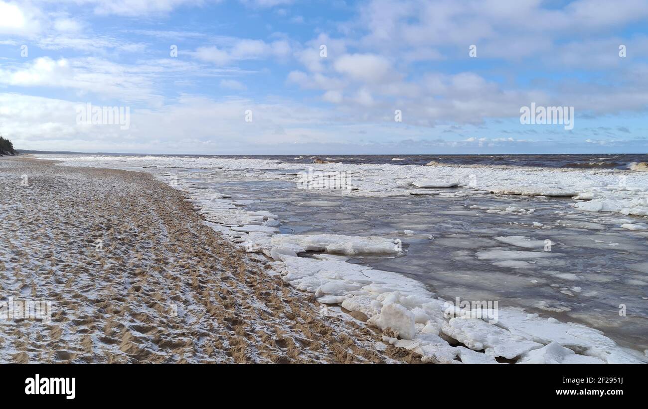 Baltic Sea on wintertime with broken ice cracks. Large pieces of ...