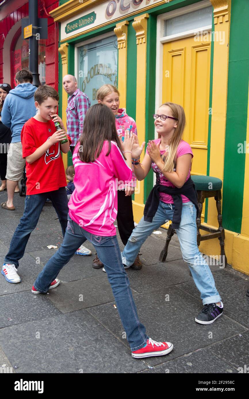 Girls playing hand clap game hi-res stock photography and images - Alamy