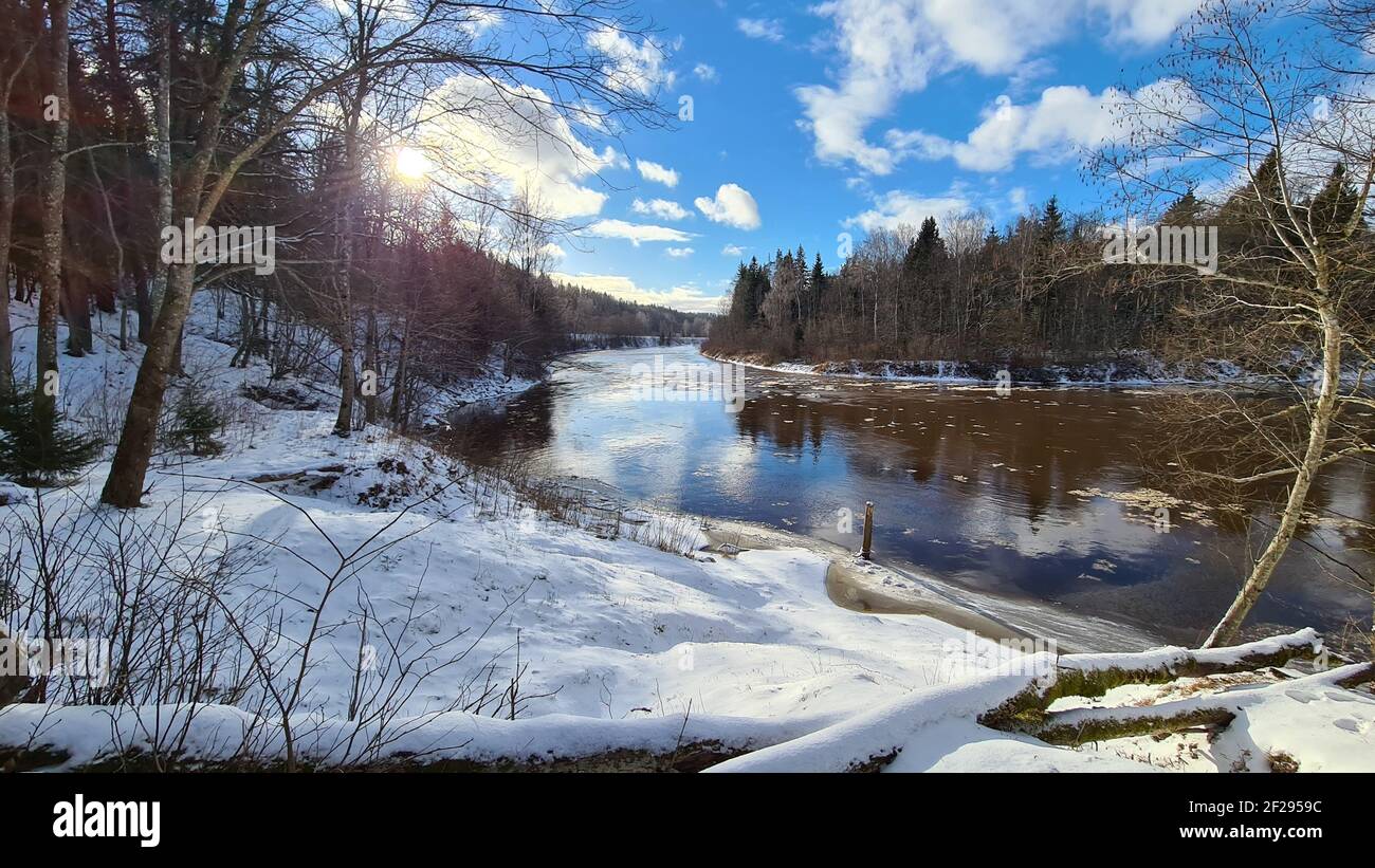 Snow covered river bank green hi-res stock photography and images - Alamy
