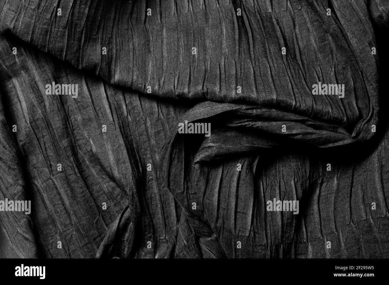 a charming expanse of black cloth, cloth that can be used for clothes ...