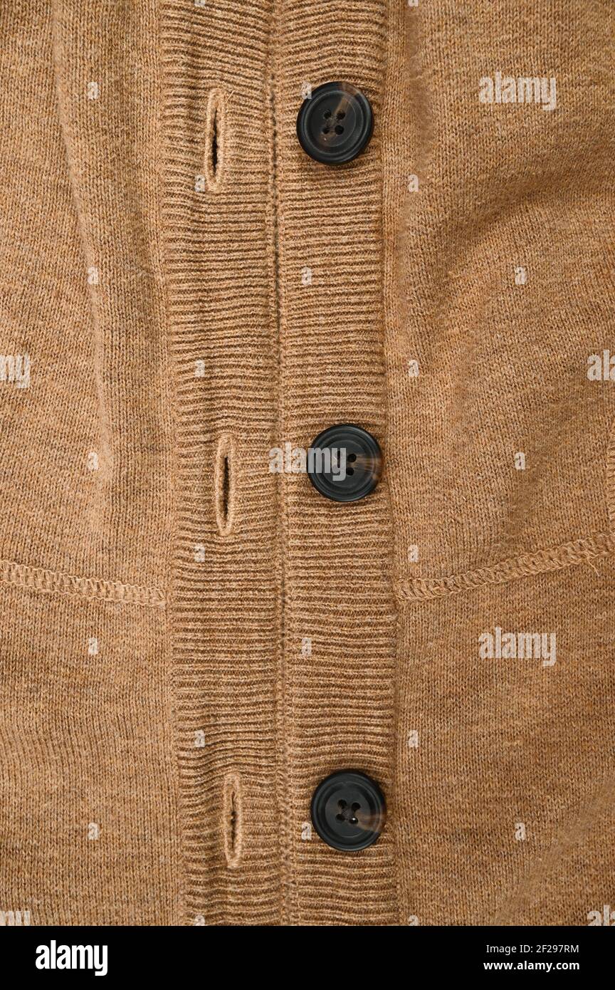 Sweater buttons hi-res stock photography and images - Alamy