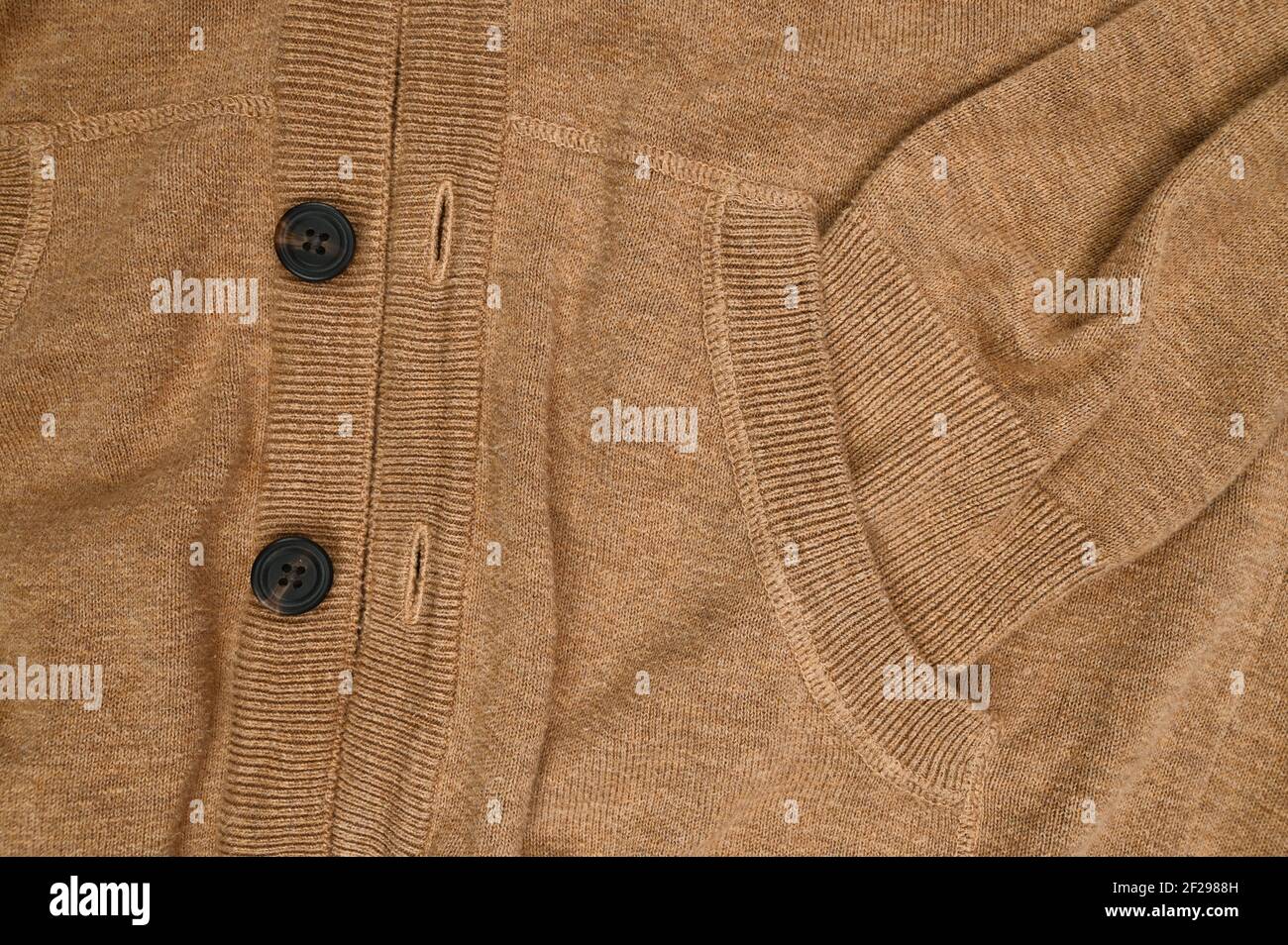 Sweater buttons hi-res stock photography and images - Alamy