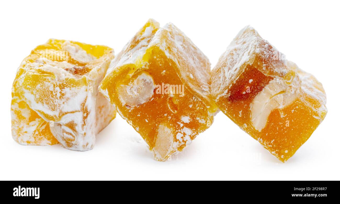 Yellow Turkish Delight sweets isolated on white Stock Photo - Alamy