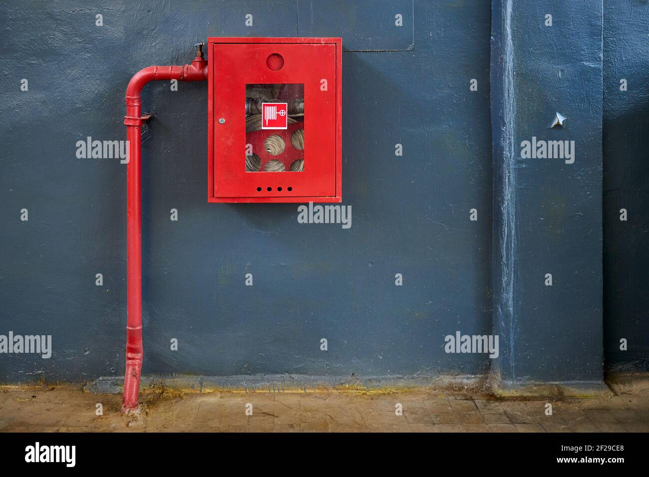 Fire hose reel symbol sign hi-res stock photography and images - Alamy