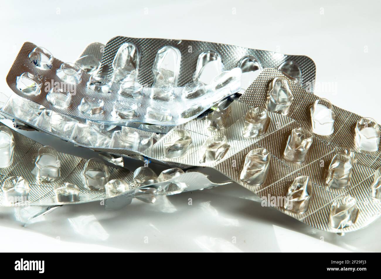 group of silver empty pills blister isolated Stock Photo - Alamy