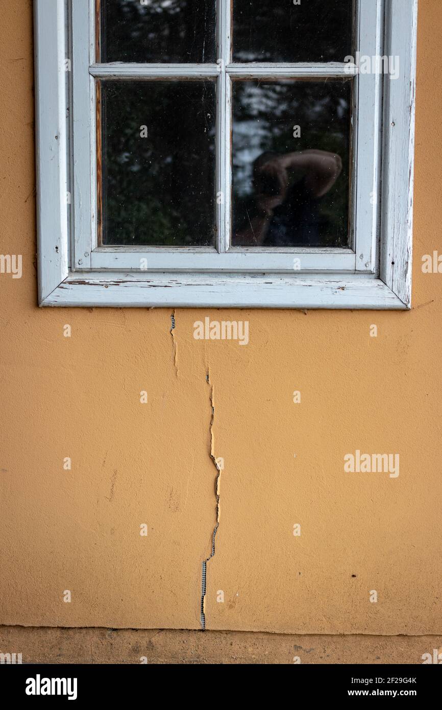 Yellow outdoor wall with window Stock Photo - Alamy