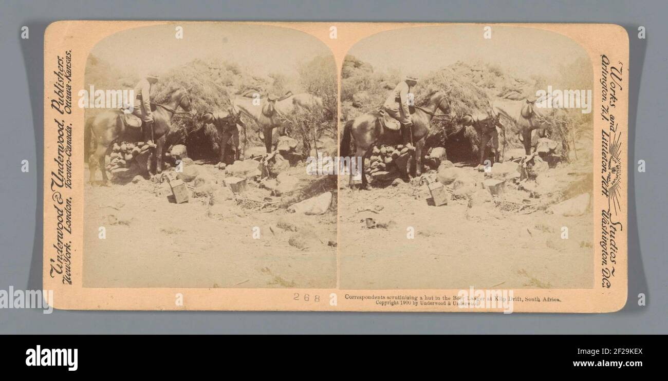 Correspondents scrutinizing a hut in the Boer Laager at Klip Drift ...