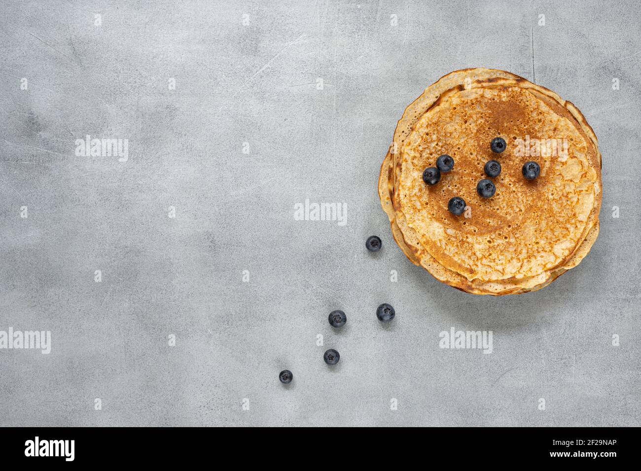 Tasty homemade rustic pancake on concrete background. Table top view ...