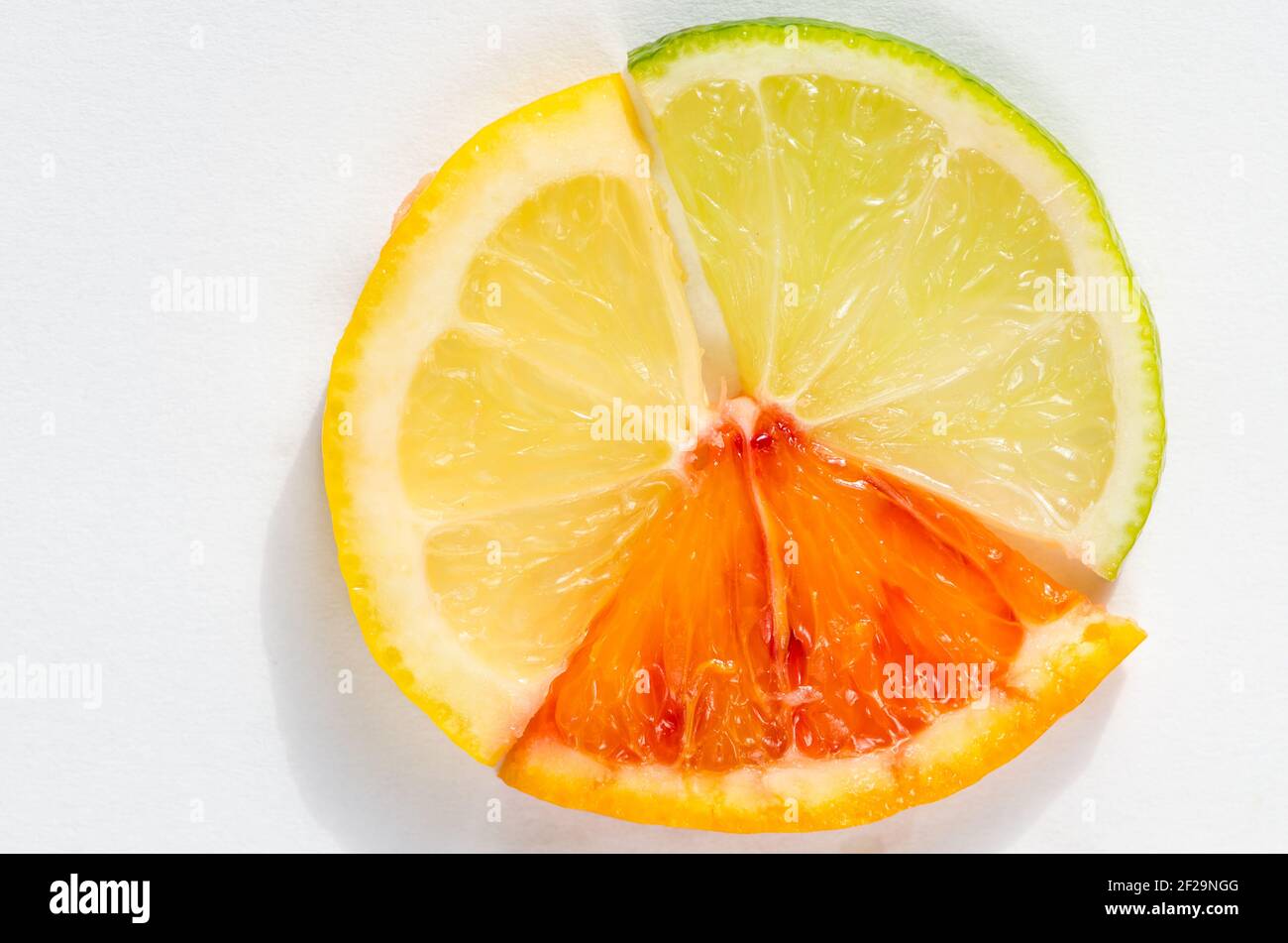 detail of red orange, lime and lemon slice combined together Stock ...